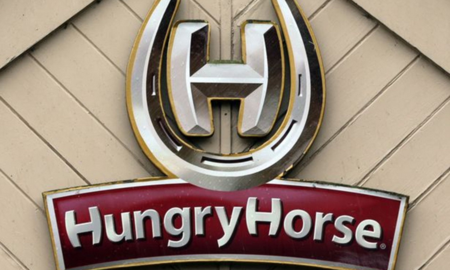 Two pizzas with a lasagne sandwiched inside now being sold by UK pub ...