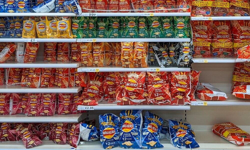 Walkers explains why its cheese and onion crisp packets are blue
